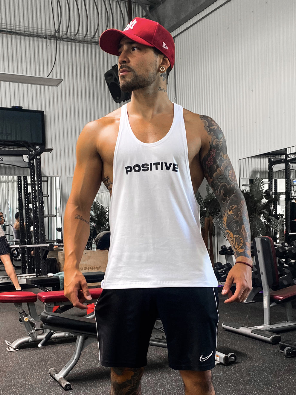 POLERA MUSCULOSA STRINGER BLANCA – POSITIVE